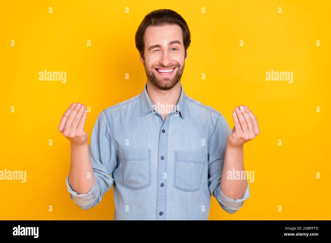 Photo portrait of young guy smiling asking money winking positive ...