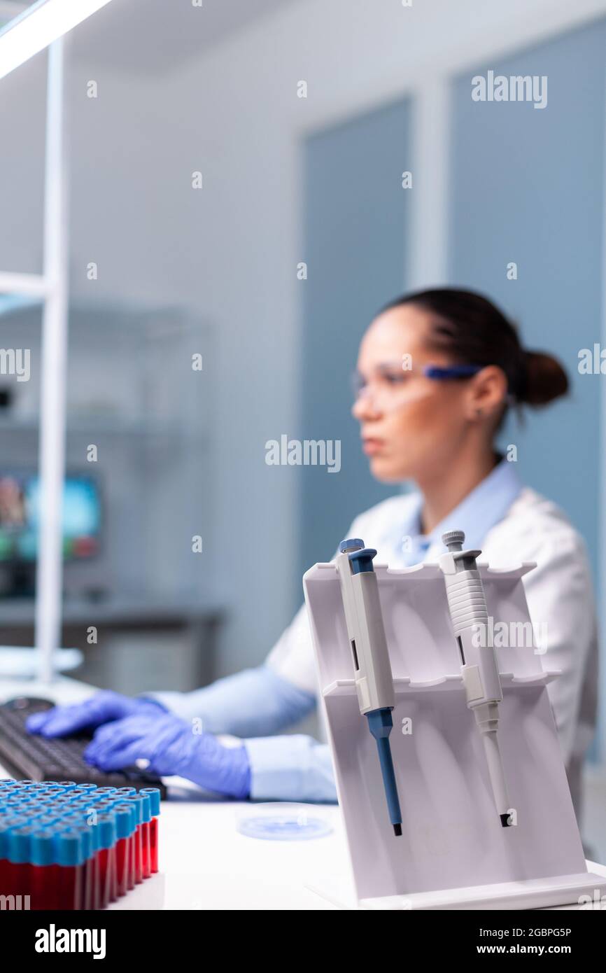 Biochemistry doctor analyzing virus infection developing pharmaceutical ...