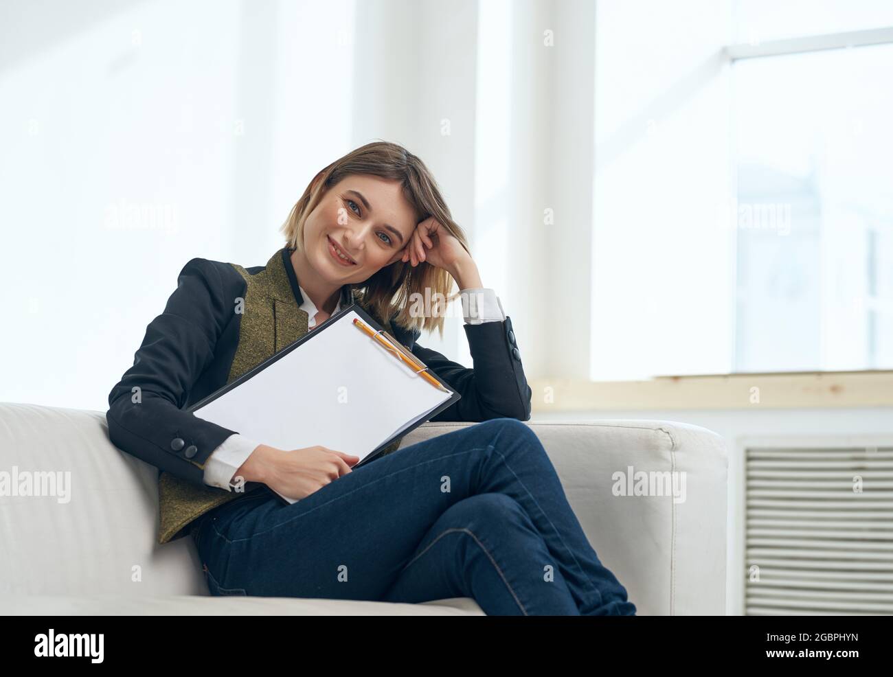 Business woman sitting on the couch job interview manager Stock Photo ...