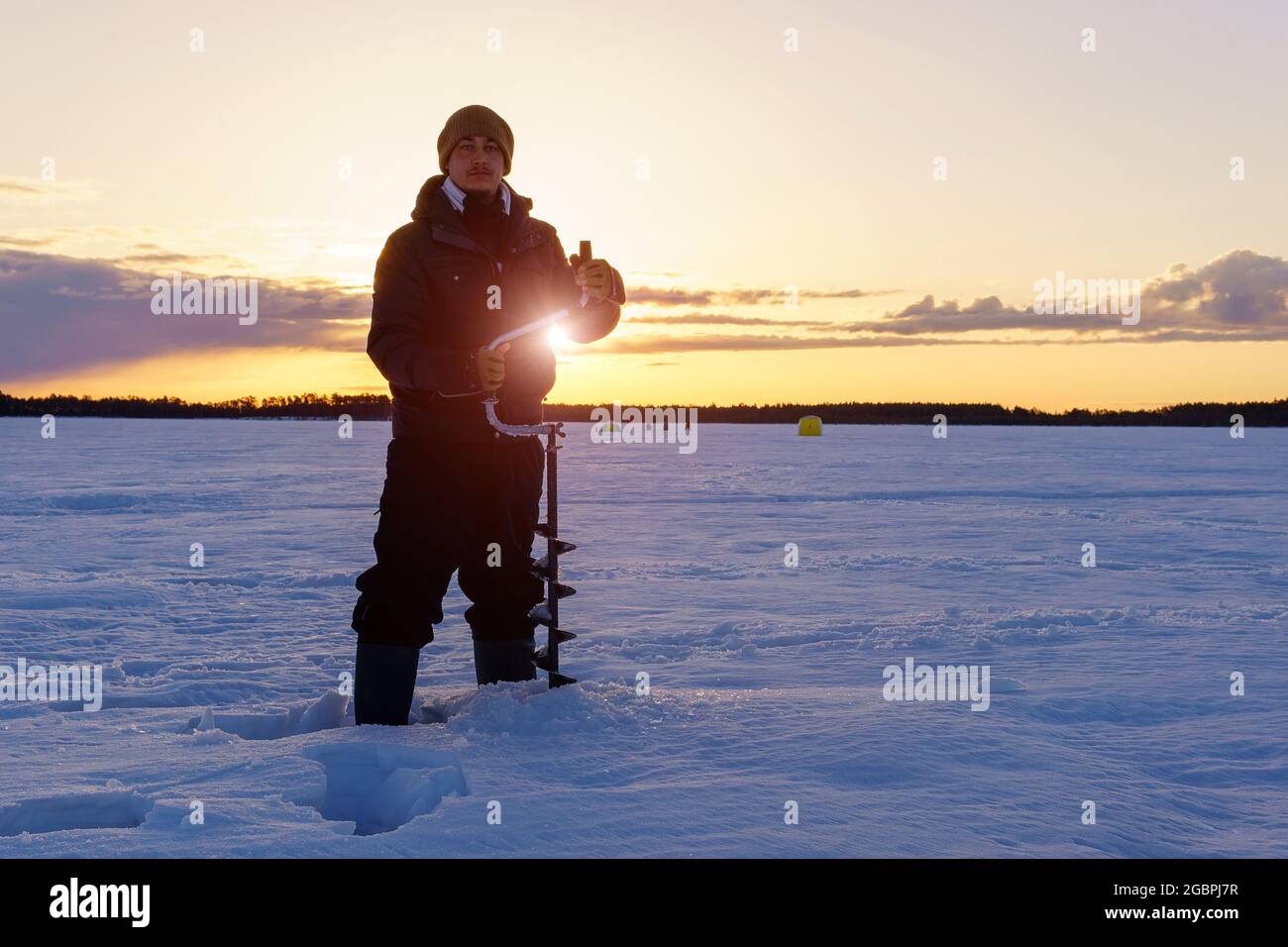 Adult caucasian male ice fishing hi-res stock photography and images ...
