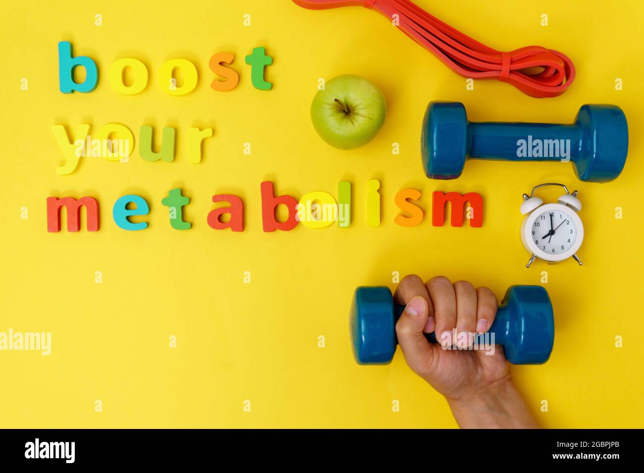 Boost your metabolism health concept. Top view yellow background ...