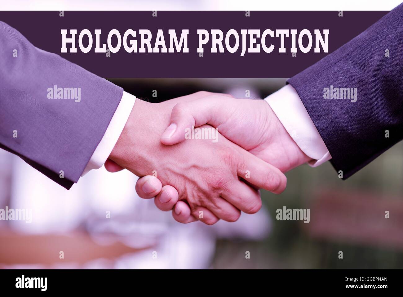 Hand writing sign Hologram Projection. Business idea photographic ...