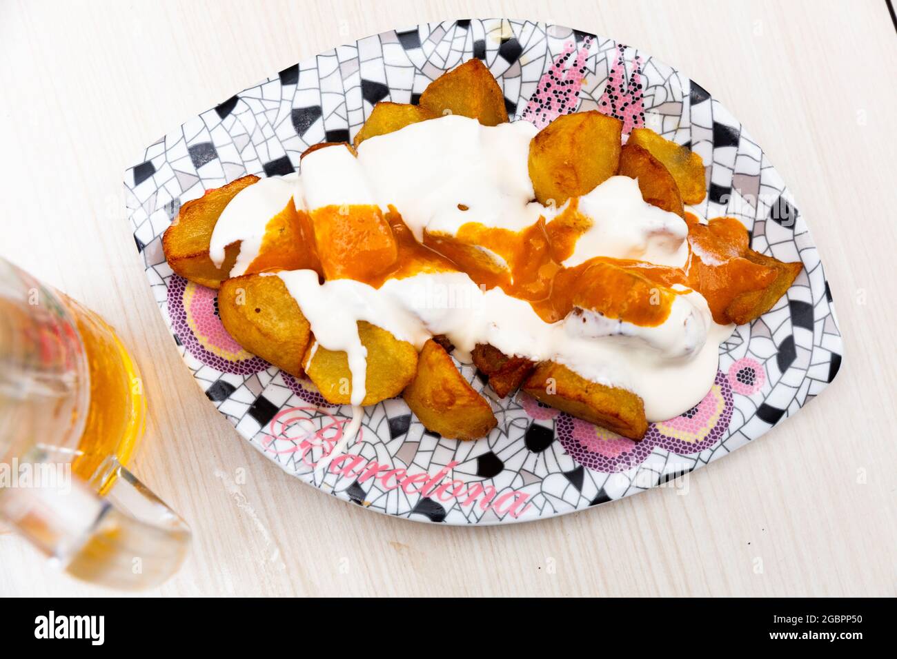 Spanish fried potatoes patatas bravas Stock Photo - Alamy