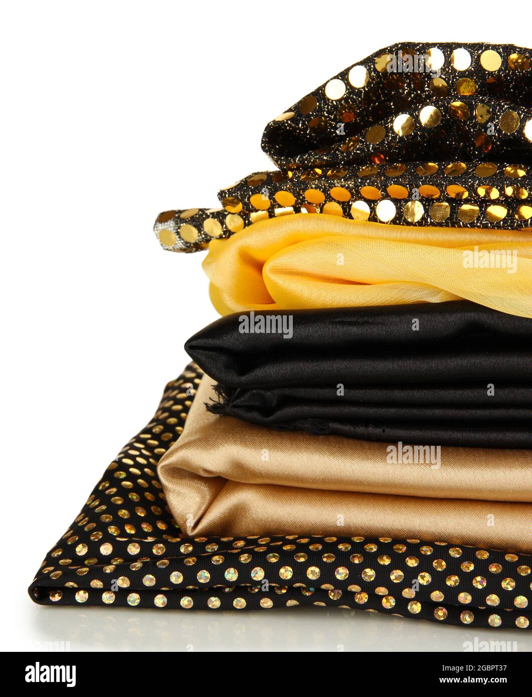 Pile of different fabrics isolated on white Stock Photo - Alamy