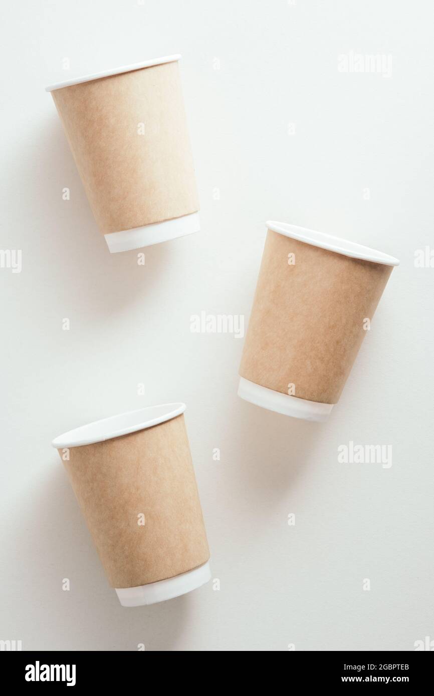 Paper coffee cups set on white background. Flat lay, top view hot drink ...