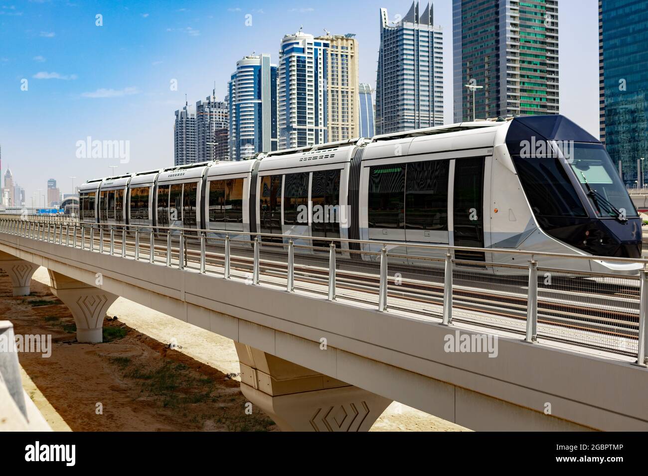Metro railway train in Dubai city in UAE Stock Photo - Alamy