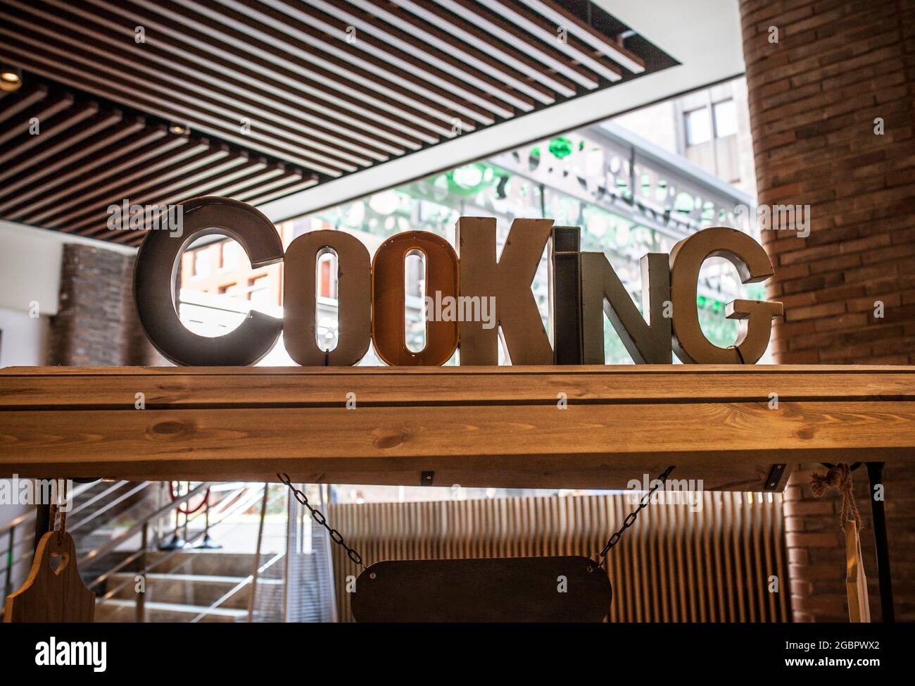Wooden cooking letters over appetizers cart. Catering decoration ...