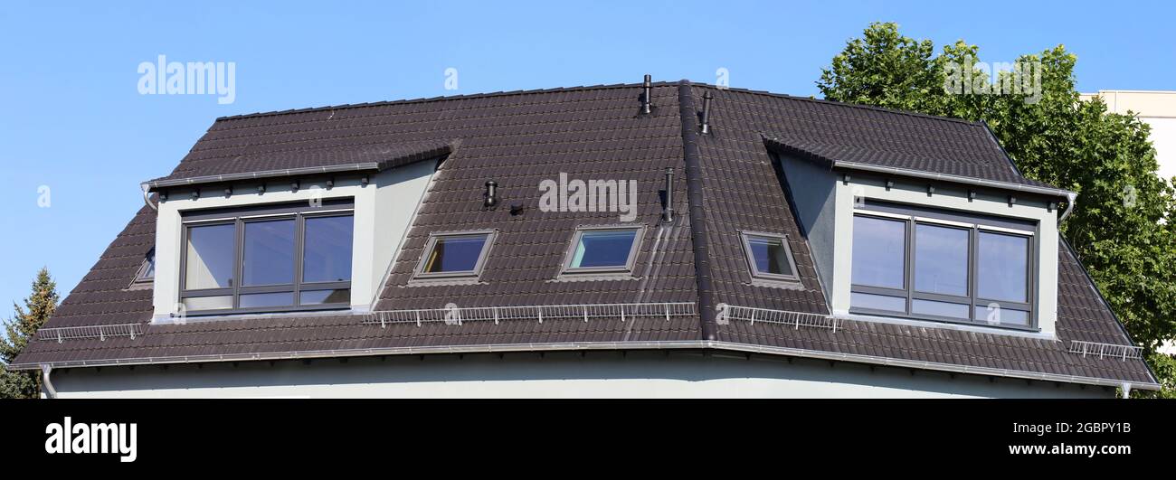 New tiled roof with dormers Stock Photo - Alamy
