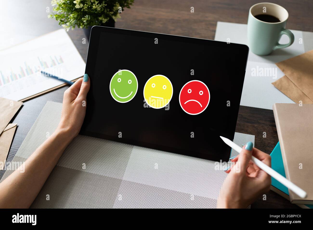 Colored smiles. Customer satisfaction control on device screen. Service ...