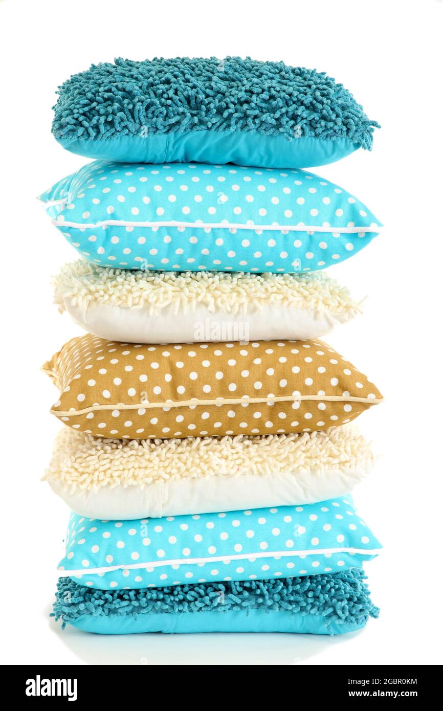 Hill colorful pillows isolated on white Stock Photo - Alamy