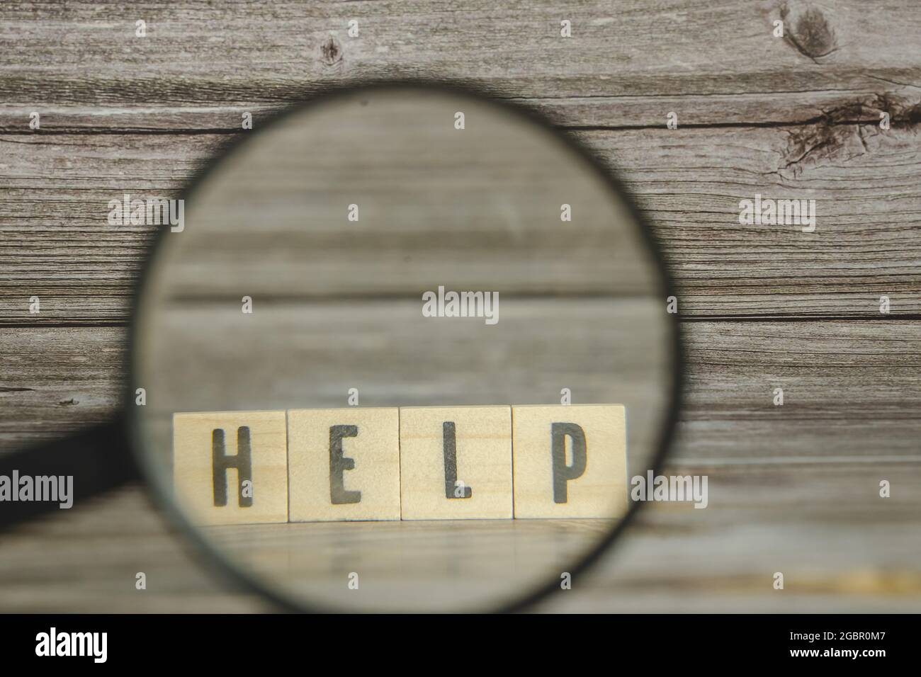 Help Word Written In Wooden Cube Stock Photo - Alamy