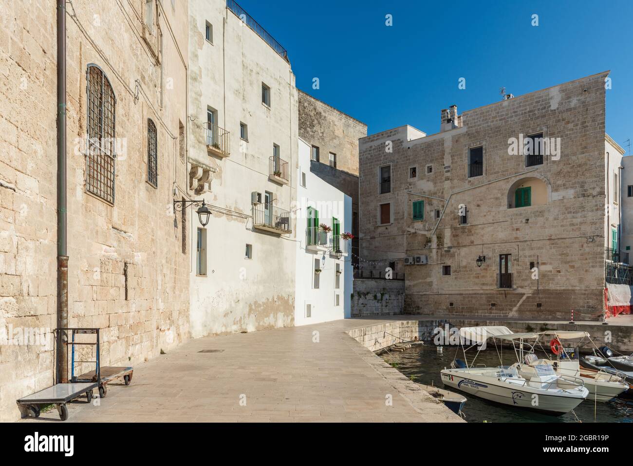 Architectures of the port and the historic center of Monopoli Stock ...