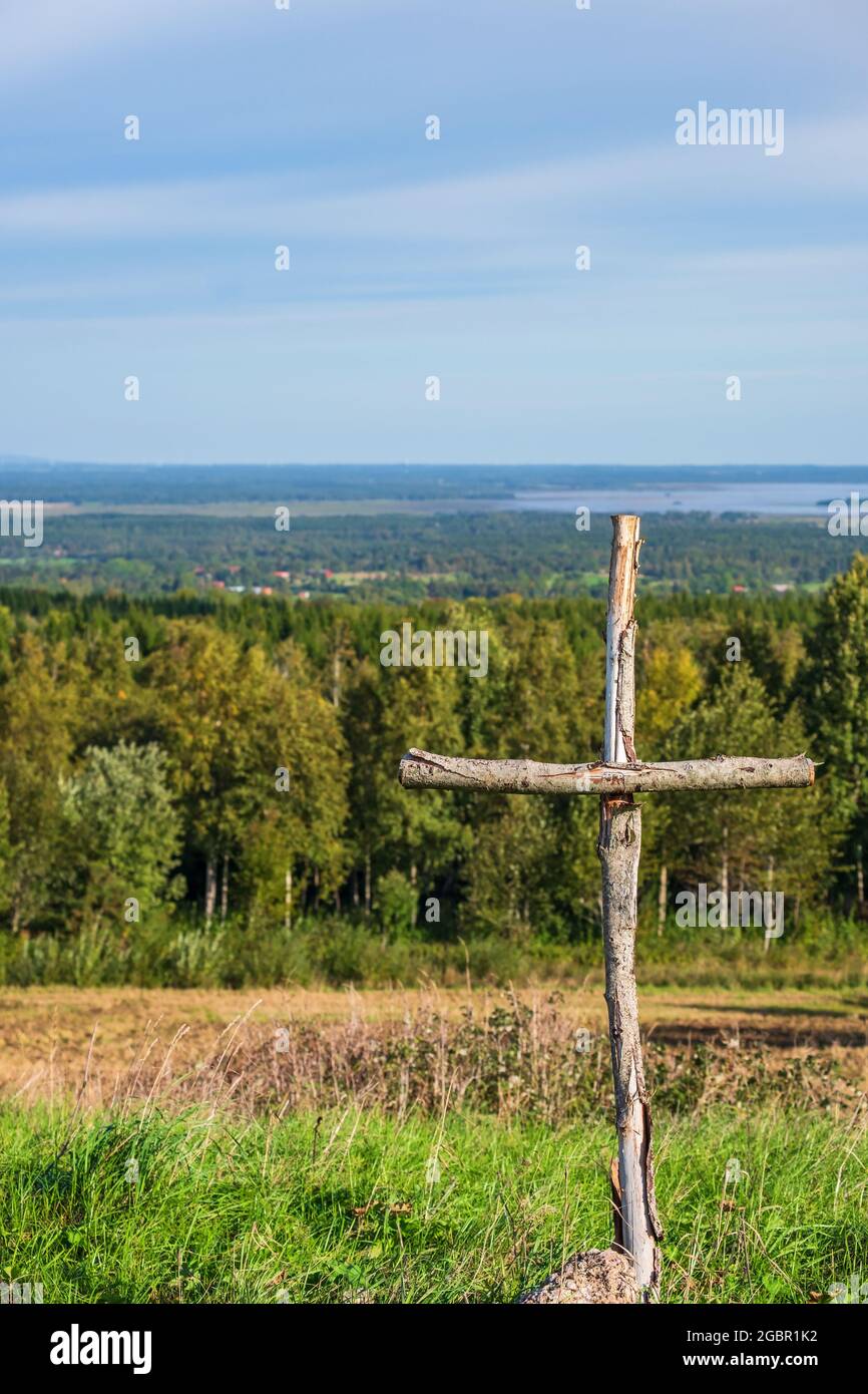 Wooden cross in a beautiful landscape Stock Photo - Alamy