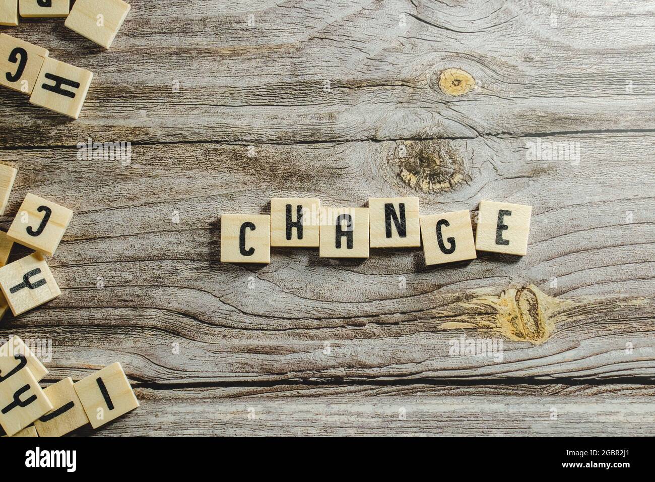 Change word cube on wood background ,English language learning concept ...
