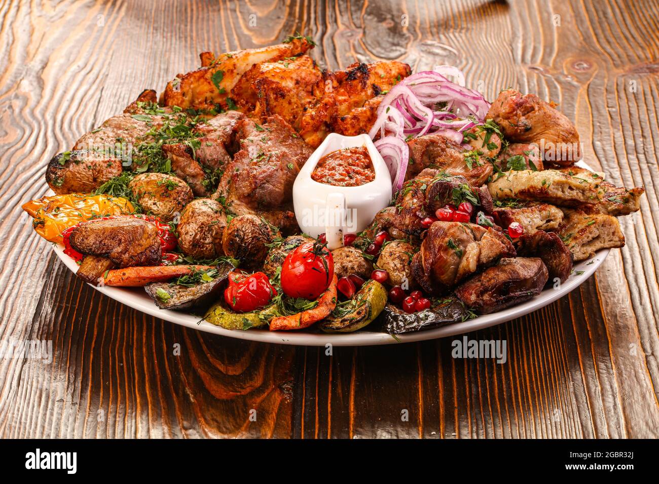 Bbq mix plate with beef, pork, lamb and chicken Stock Photo - Alamy