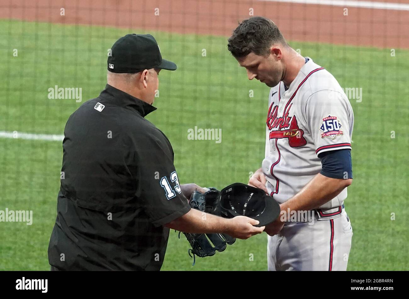 Atlanta Braves starting pitcher Drew Smyly has his cap and glove ...