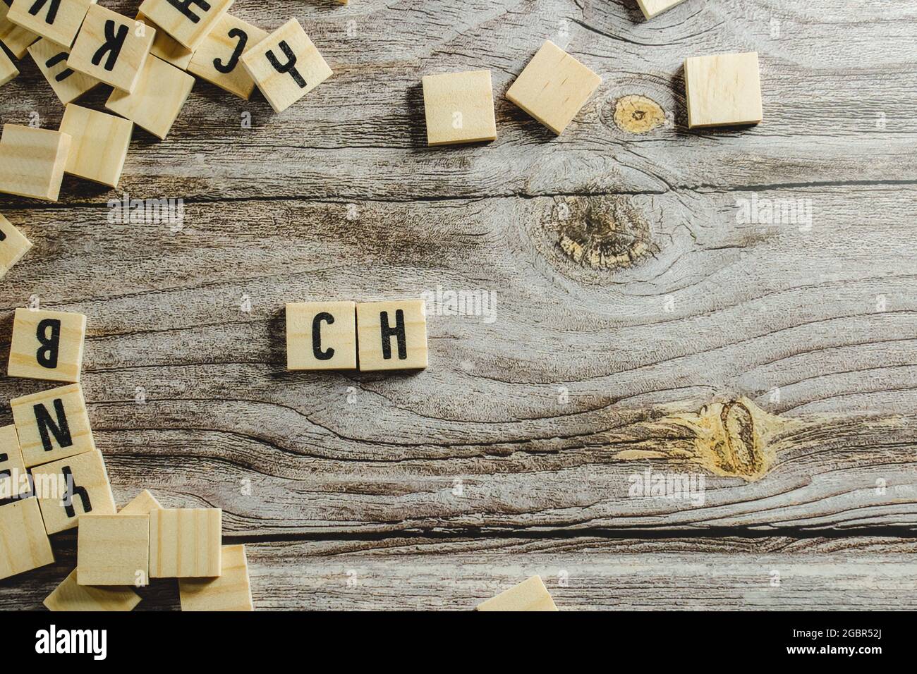 Change word cube on wood background ,English language learning concept ...