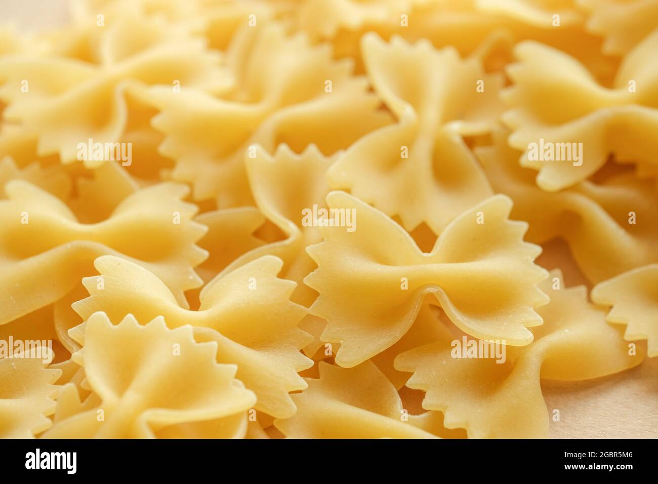 Closeup dry macaroni background. Textured kitchen background of food ...