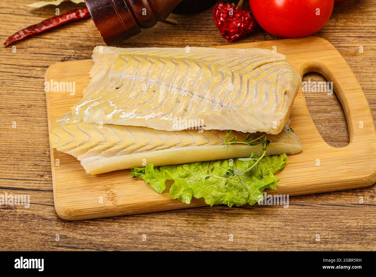 Raw cod fish fillet for cooking Stock Photo - Alamy