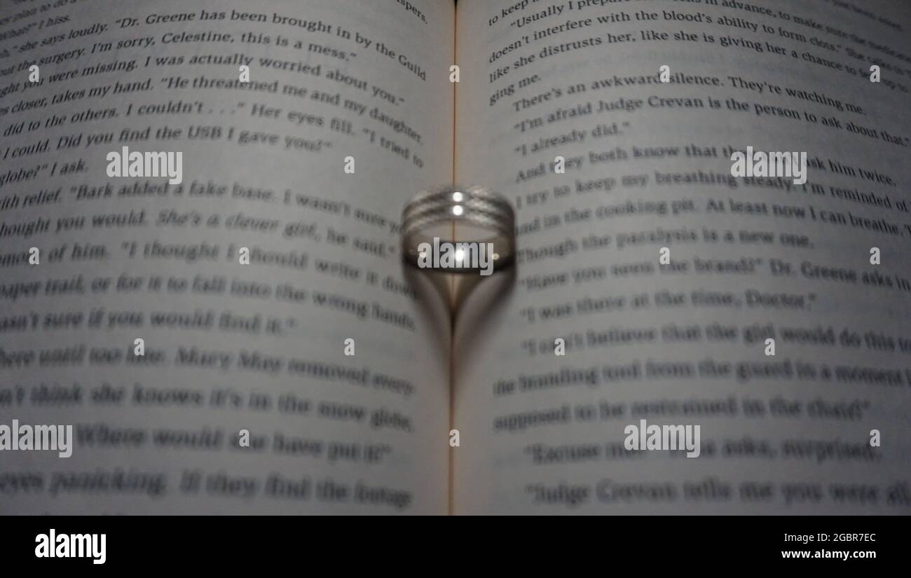 Wedding ring book heart hi-res stock photography and images - Alamy