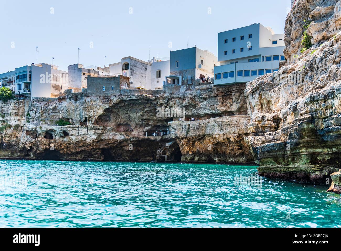 Polignano a Mare seen from the sea. Cliffs and caves Stock Photo - Alamy