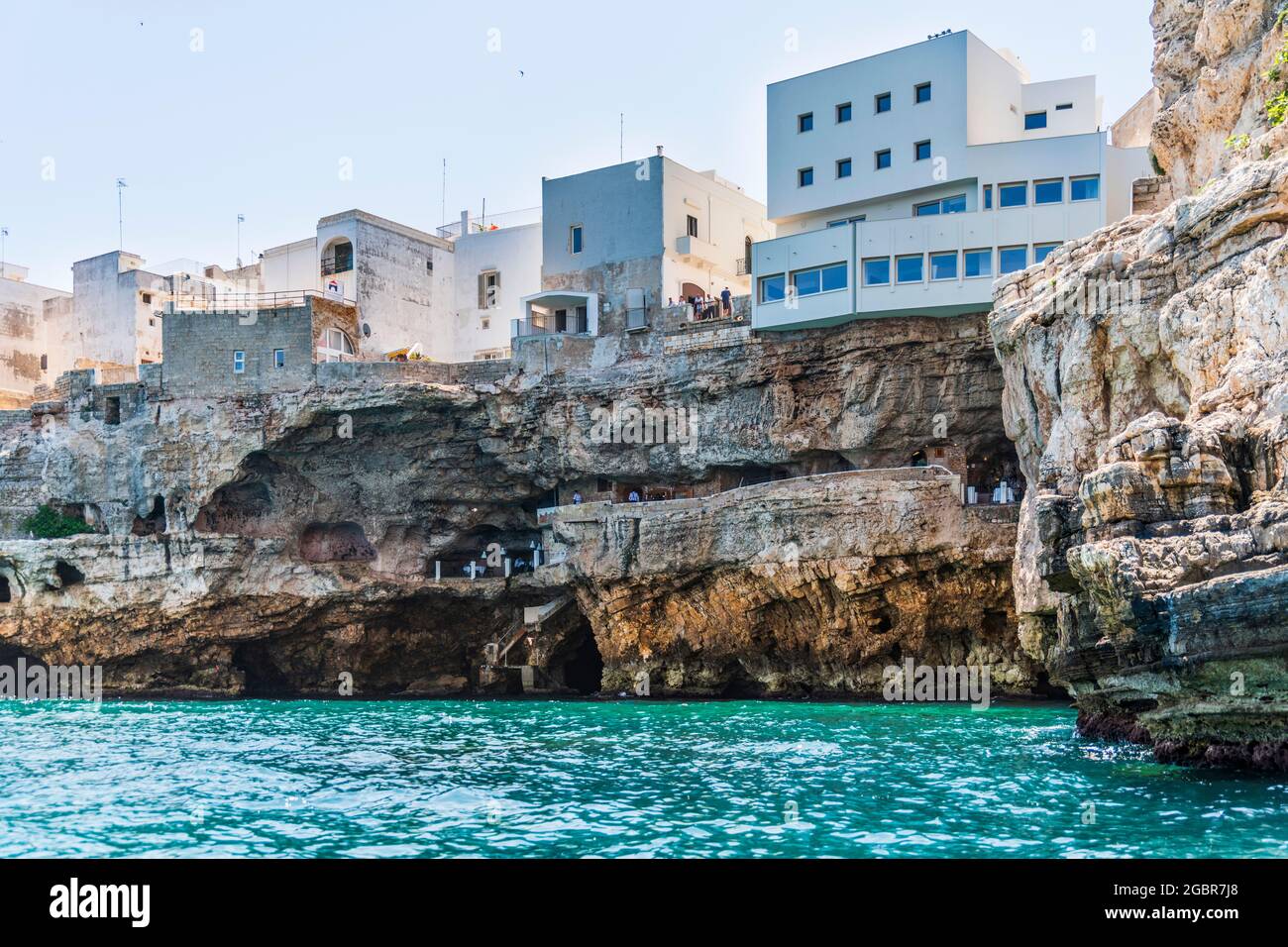 Polignano a Mare seen from the sea. Cliffs and caves Stock Photo - Alamy