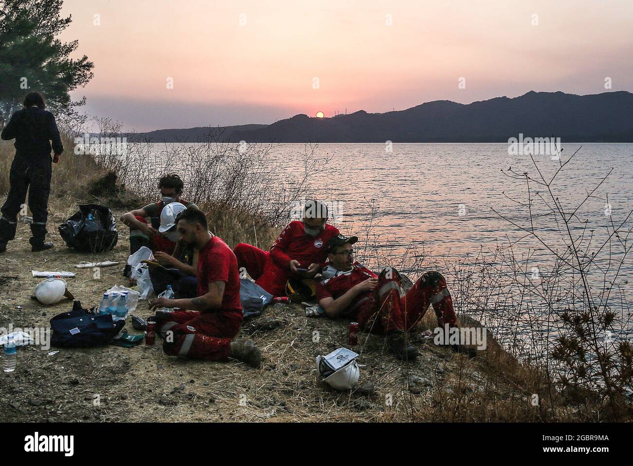 Fire fighters work to stop forest fires near villages at Marmaris ...