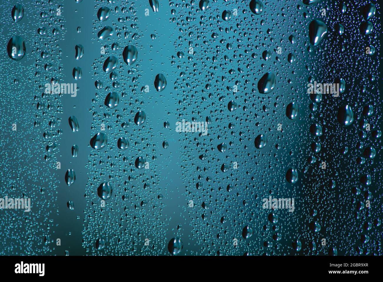 Natural blue water drop background Stock Photo - Alamy