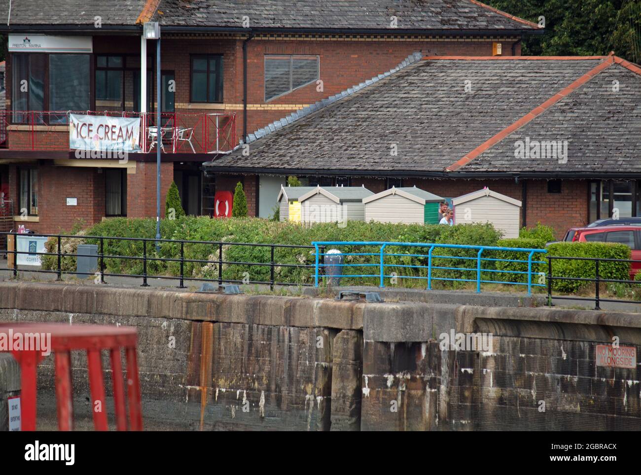 Beach Huts arrive at the Beach Hut Stock Photo - Alamy