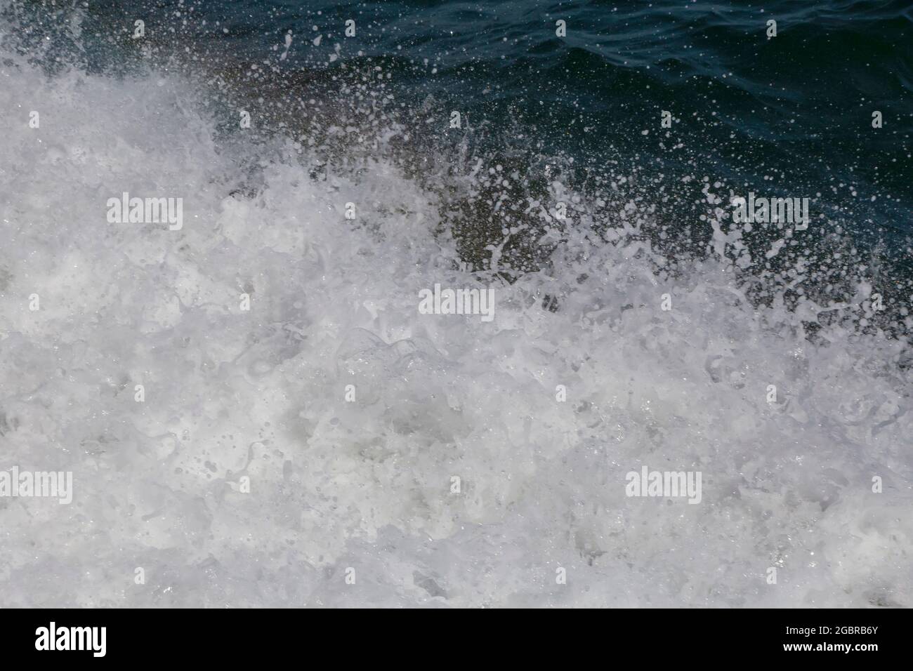 view on white foamy splash from sea wave Stock Photo - Alamy