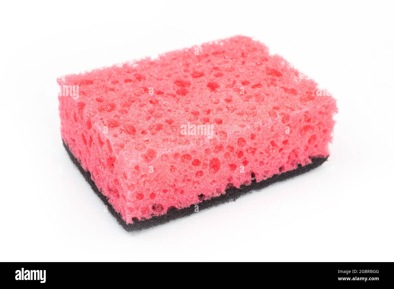 Kitchen sponge close-up isolated on white background Stock Photo - Alamy