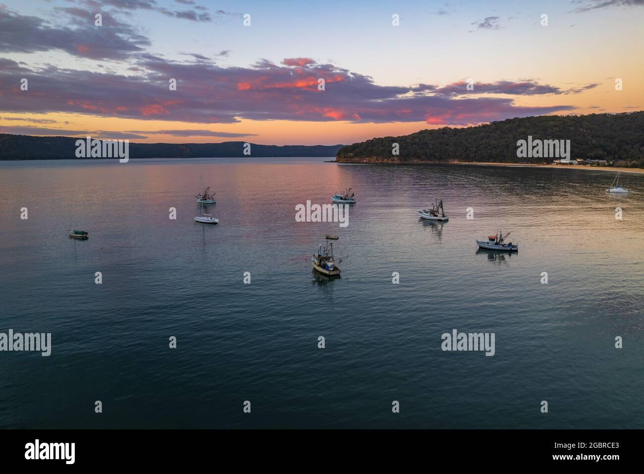 Fishing Boats and sunrise in Brisk Bay from Patonga Beach on the ...