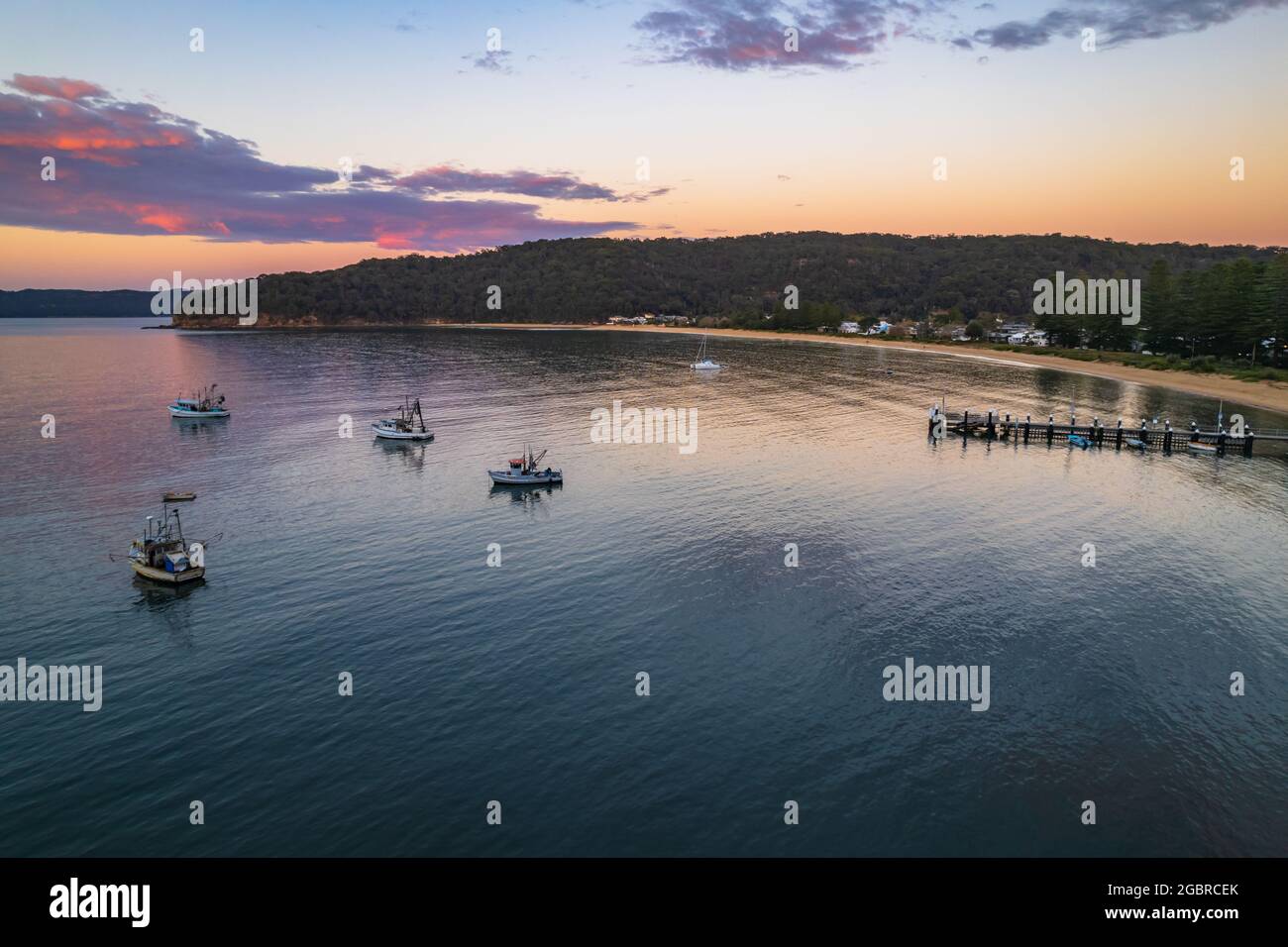 Fishing Boats and sunrise in Brisk Bay from Patonga Beach on the ...