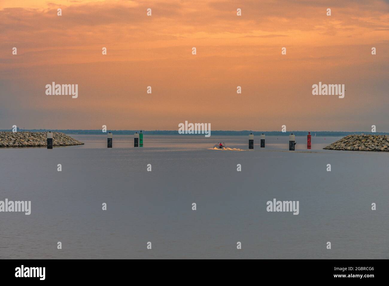 Closeup shot of a harbour barth in the Baltic sea in Germany at sunset ...