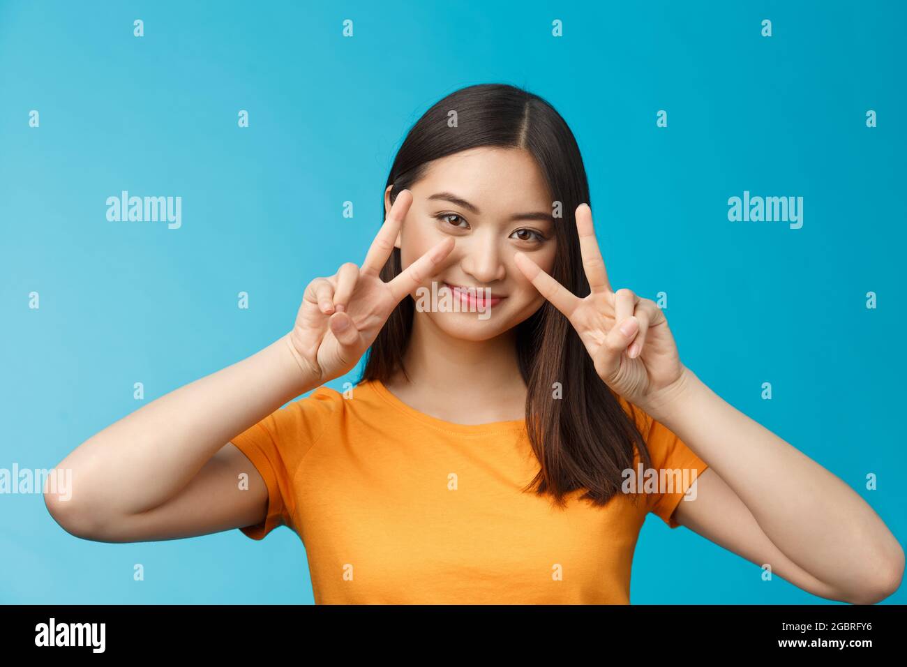 Tender cute asian woman short dark haircut show peace victory signs ...