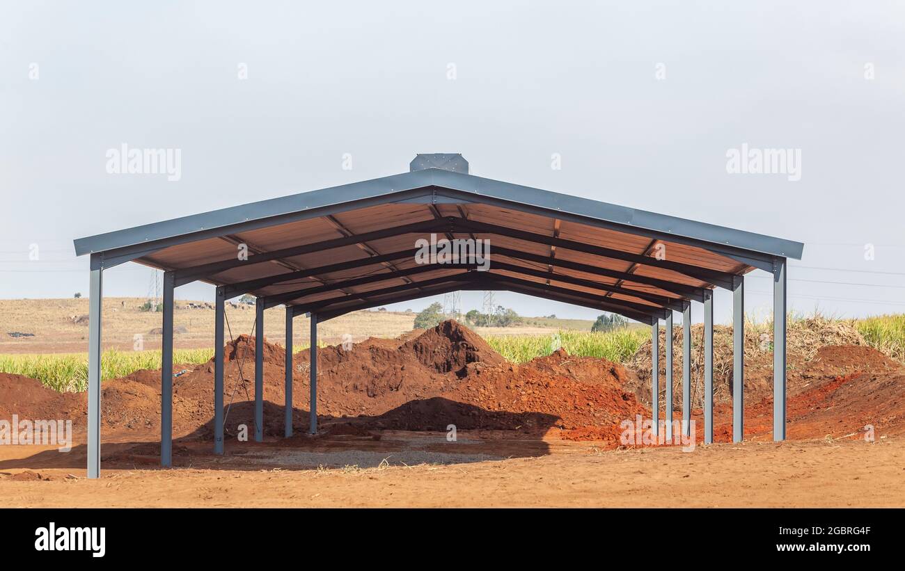 New shed open barn steel meatl roof structure on open field farming ...