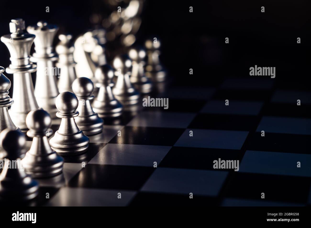 Closeup of silver chess figures on the checkerboard Stock Photo - Alamy