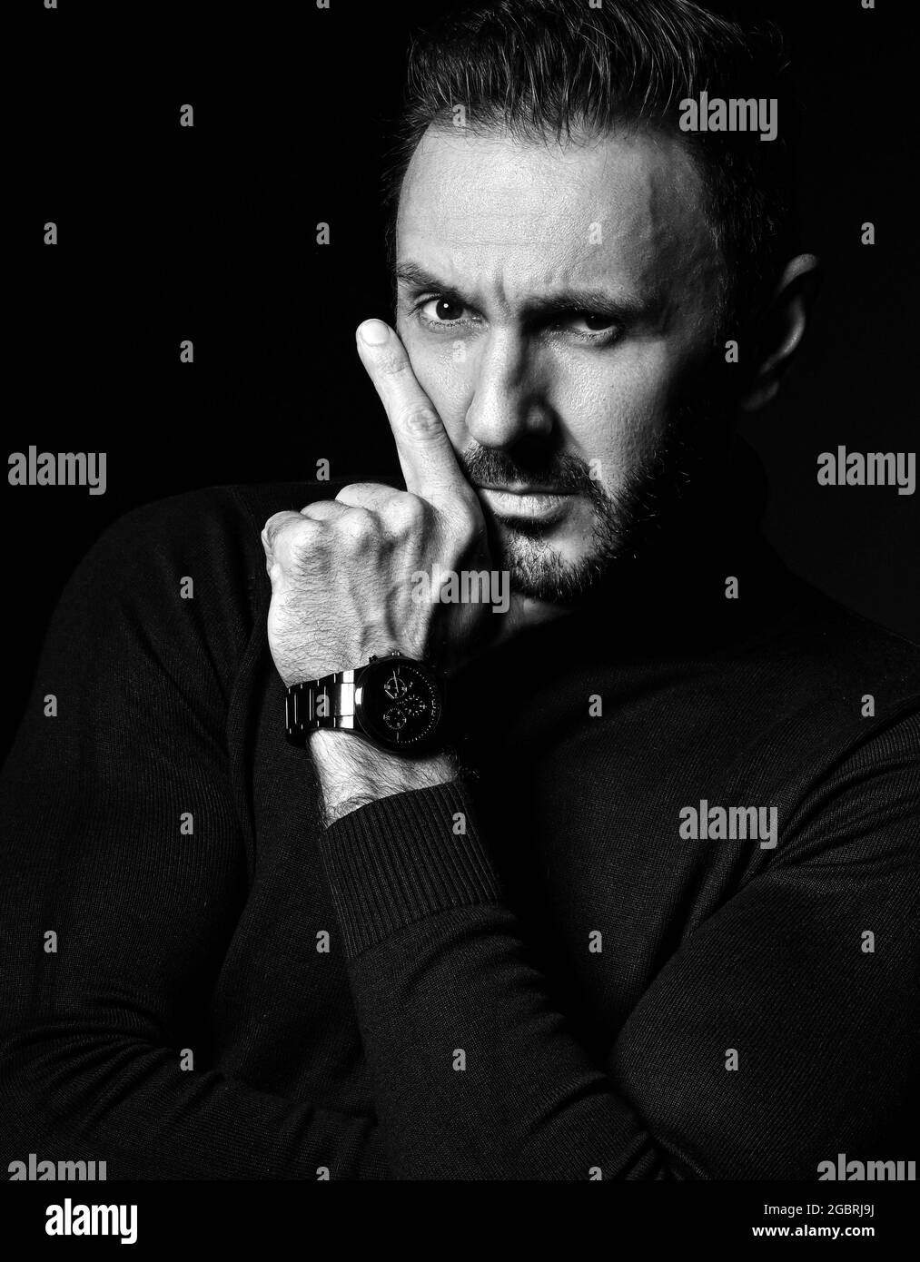 Focused black man listening Black and White Stock Photos & Images - Alamy