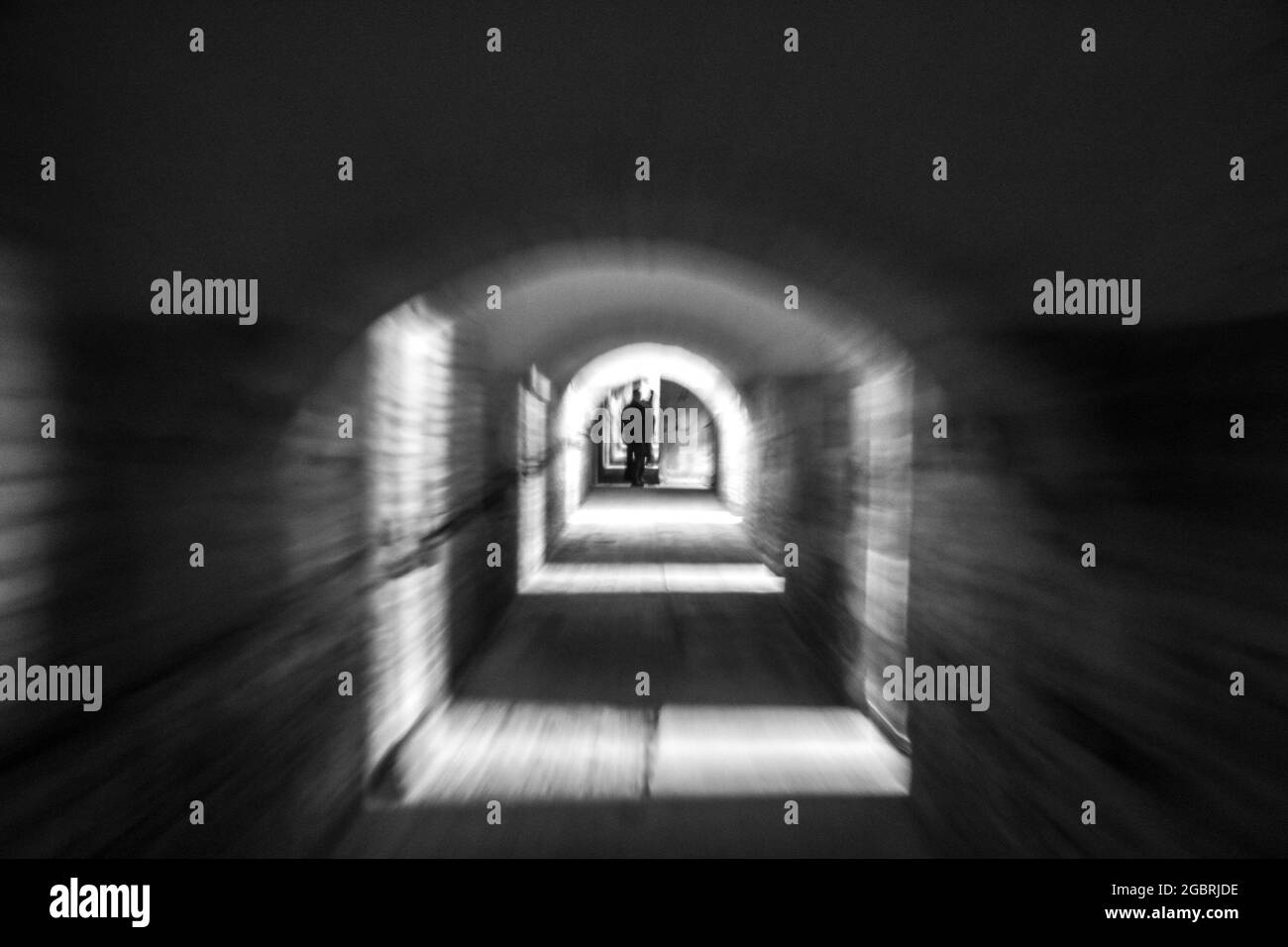 Grayscale shot of the Jilava prison tunnel in Romania Stock Photo - Alamy