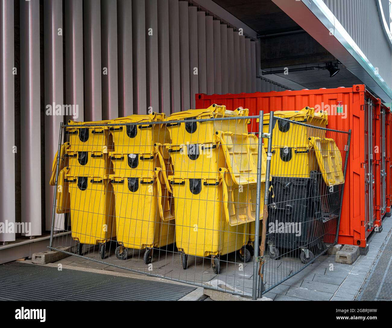Yellow Garbage Cans Stock Photo - Alamy