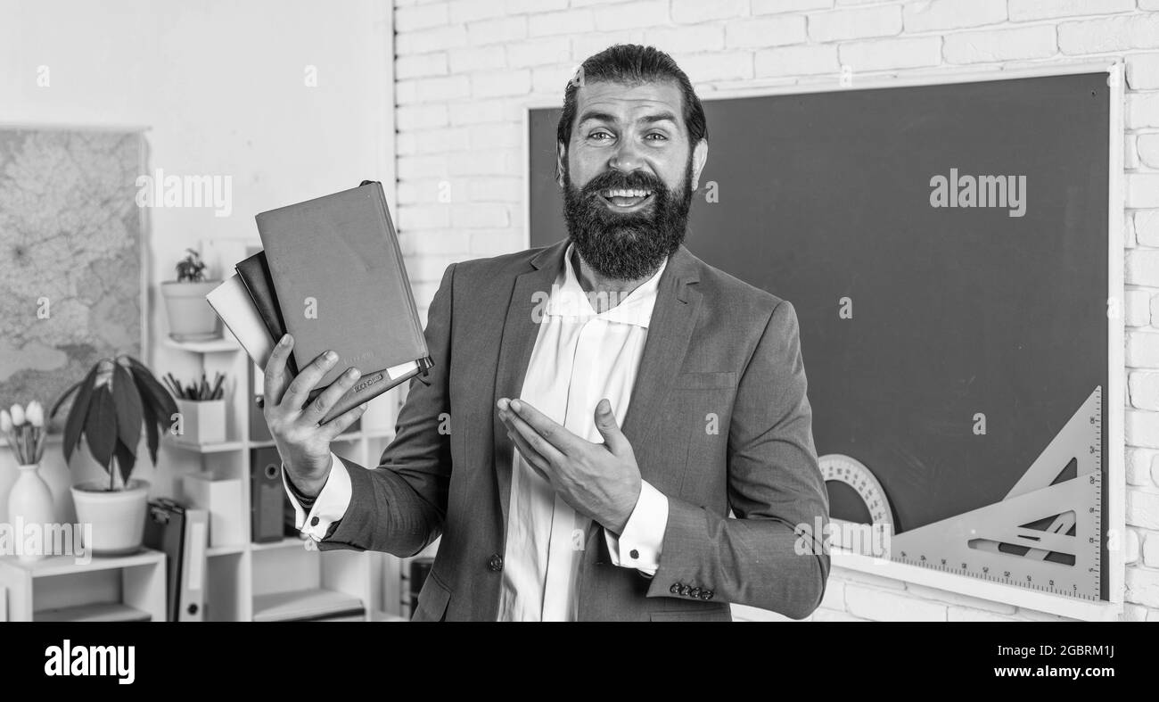 man with beard and moustache look as businessman or teacher in college ...