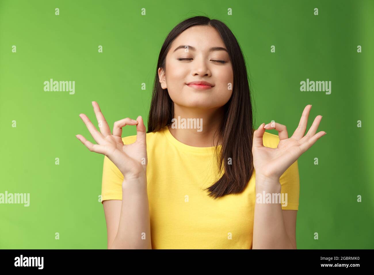 Peaceful charming asian girl brunette inhale fresh air, relaxing ...