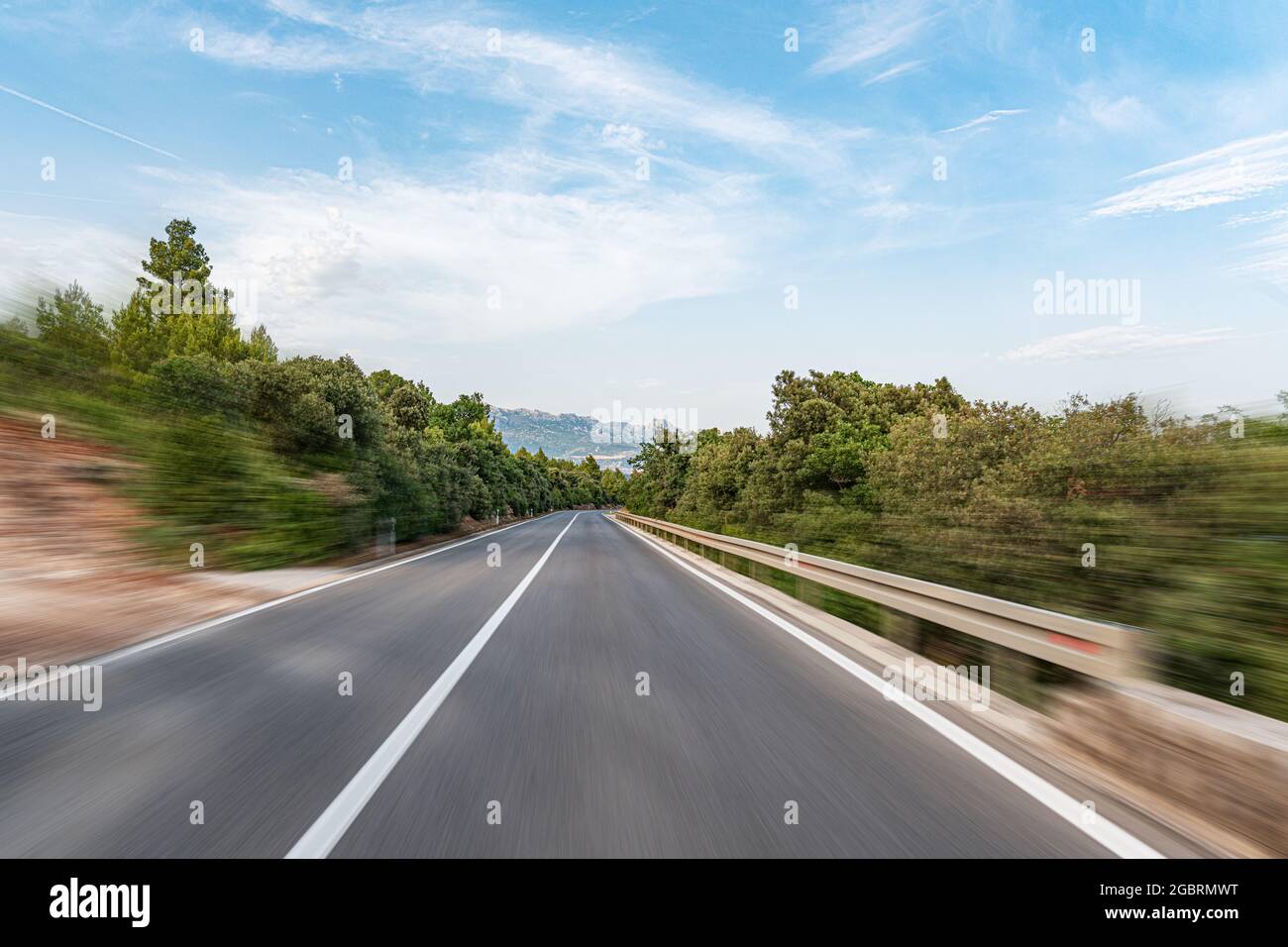Scenic road. Road is surrounded by a magnificent natural landscape ...