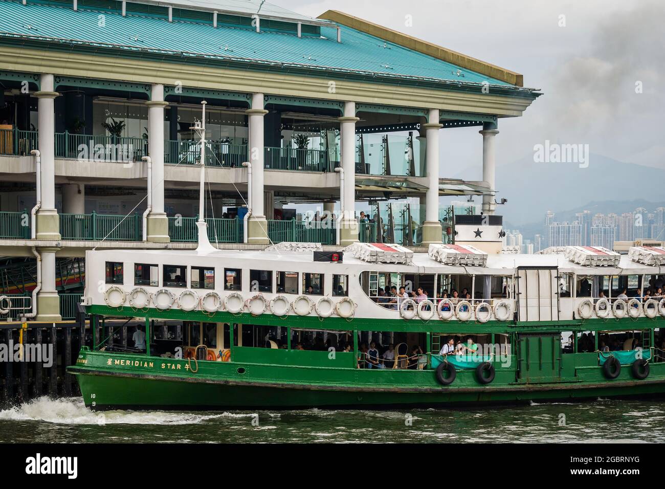 The 'Meridian Star', one of the Star Ferry fleet, at Central Ferry Pier 7 on Hong Kong Island ...