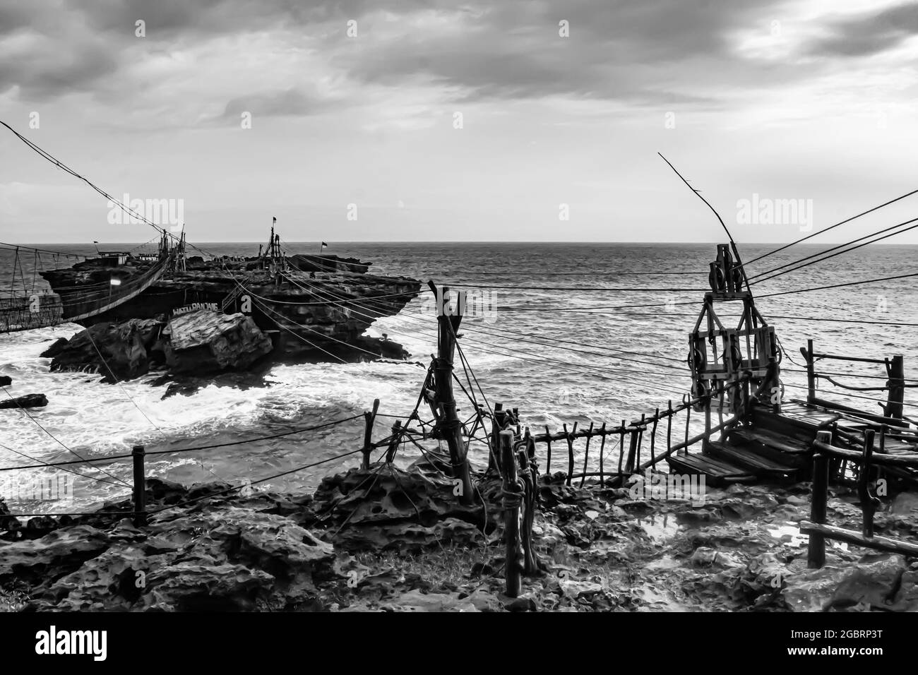 Challenge on swinging rope foot bridge and cable car to a rock i Stock ...