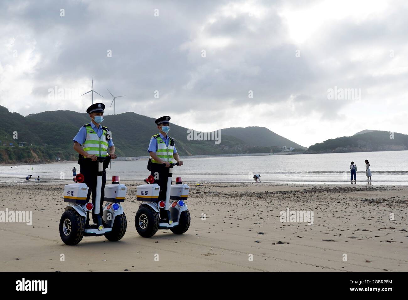 ZHOUSHAN, CHINA - AUGUST 5, 2021 - Police patrol the beach in a Police ...