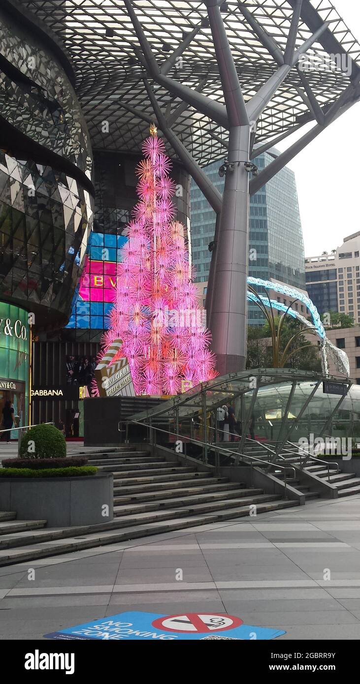 SINGAPORE, SINGAPORE - Dec 07, 2019: An electric Christmas tree in pink ...