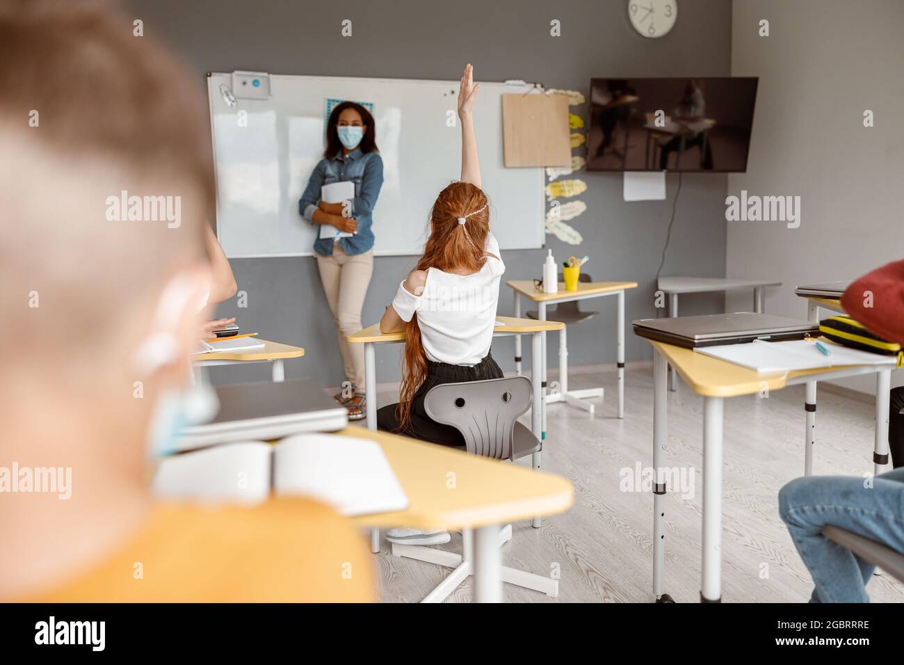 Schoolgirl wanting answer lesson hi-res stock photography and images ...