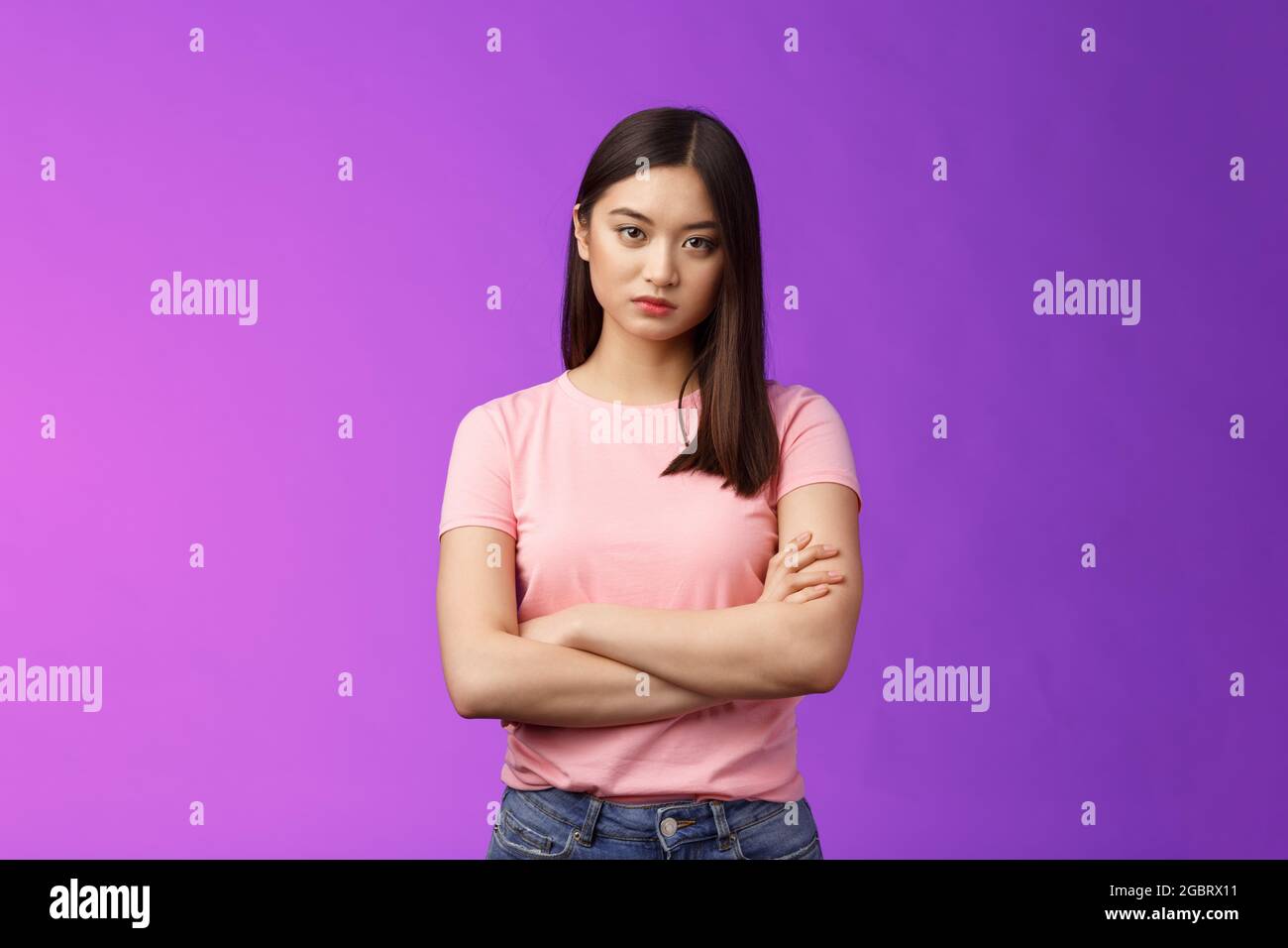 Bothered and pissed asian woman brunette, cross arms chest block ...