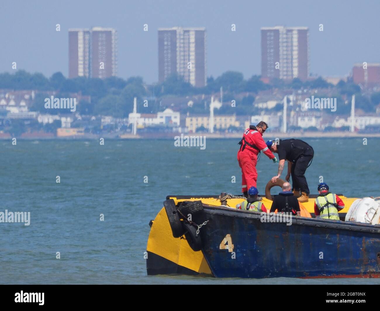 Sheerness, Kent, UK. 5th August, 2021. A mooring buoy being installed ...